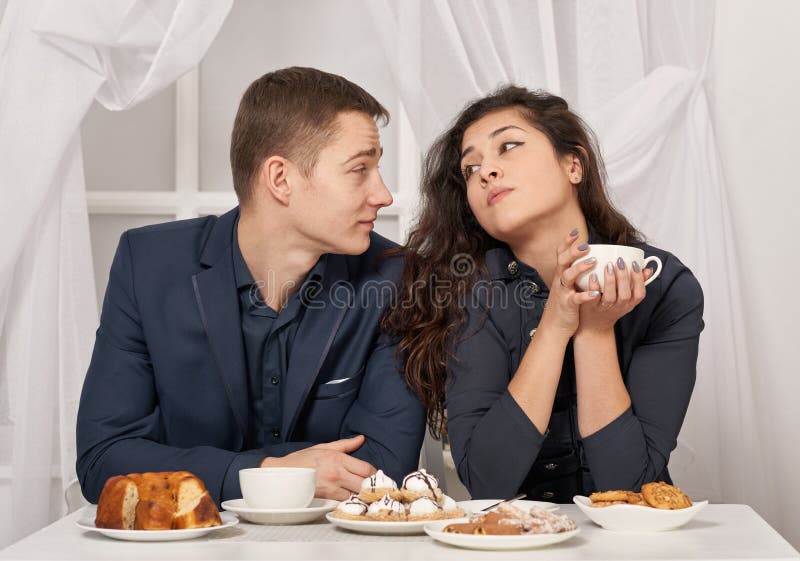 Romantic Couple Drinking Tea with Cookies and Talking Stock Photo ...