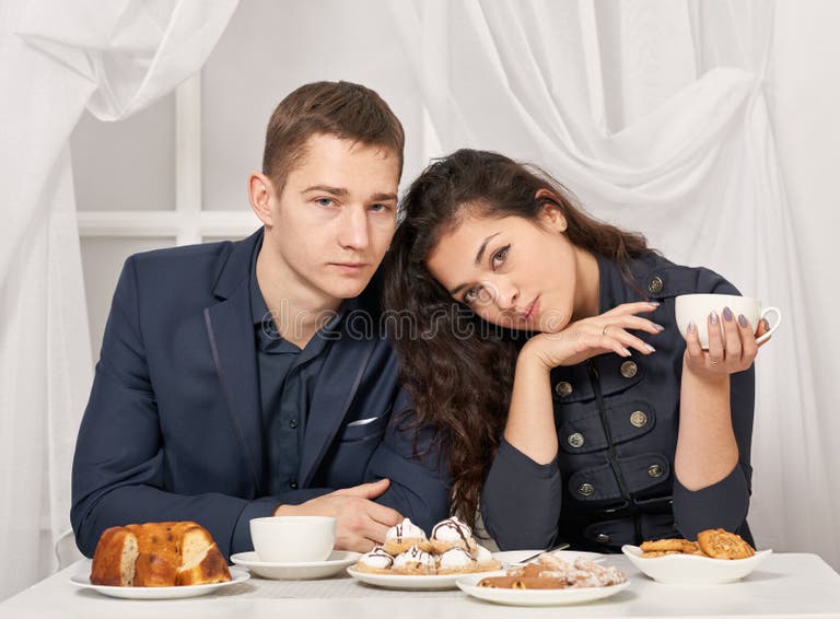 Romantic Couple Drinking Tea with Cookies and Talking Stock Image ...