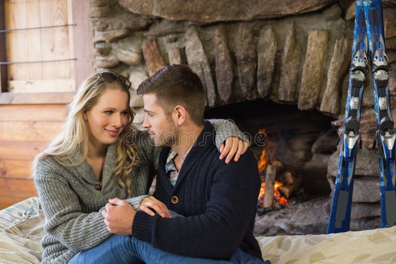 Romantic Couple in Front of Lit Fireplace Stock Image - Image of rela ...