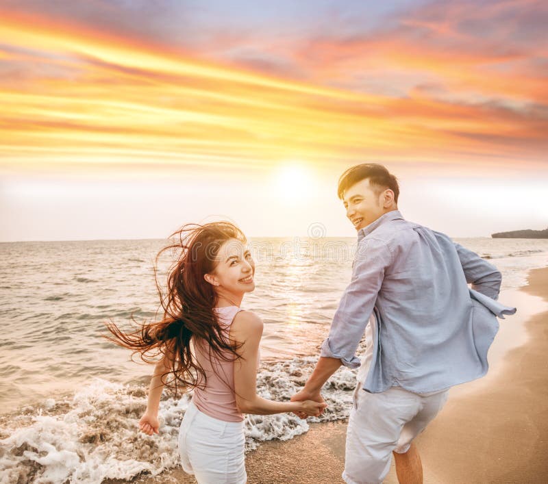 Romantic Couple Having Fun on the Beach at Sunset Stock Image - Image ...