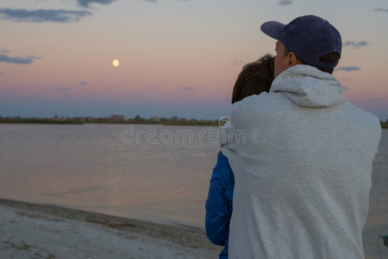 Romantic Couple Hugging on the Beach Stock Image - Image of ocean ...