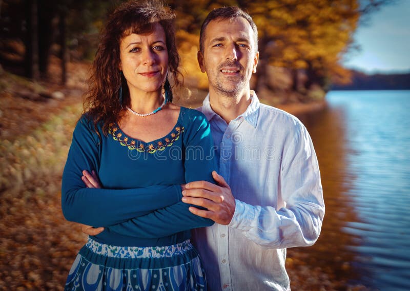 Romantic Couple in Love by the Lake in Autumn. Stock Image - Image of ...