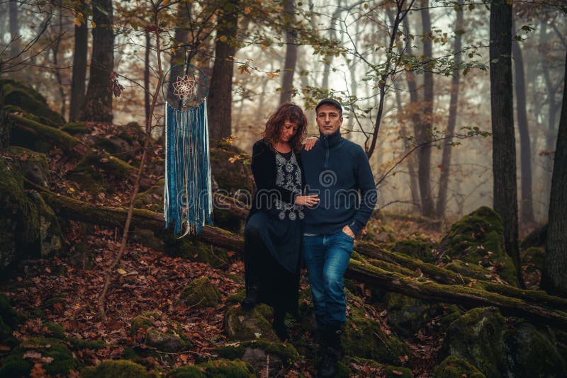 Romantic Couple in Love in a Misty Forest, with a Dream Catcher. Stock ...