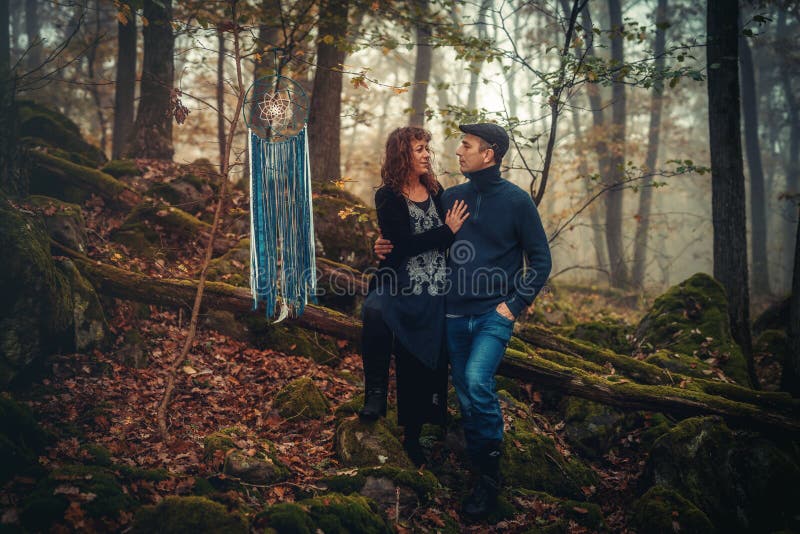 Romantic Couple in Love in a Misty Forest, with a Dream Catcher. Stock ...
