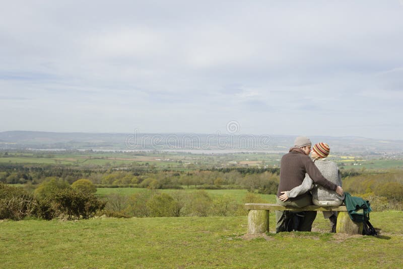 Romantic Couple on Park Bench Stock Image - Image of beautiful, nature ...