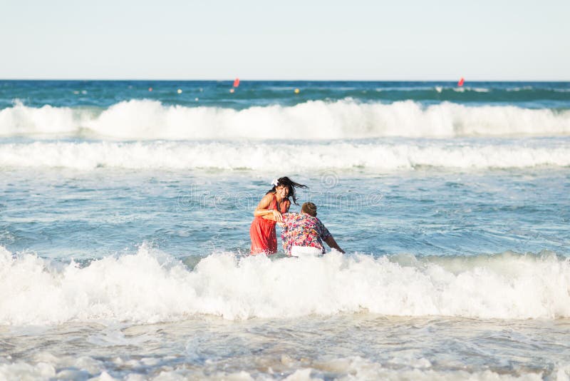 Romantic couple in the sea stock photo. Image of outdoor - 71162774