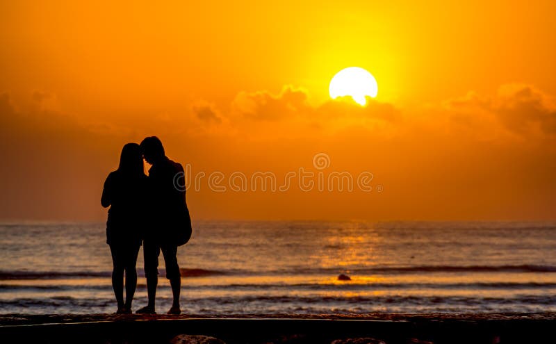 Romantic Couple Standing Together Watching the Sunset Stock Image ...