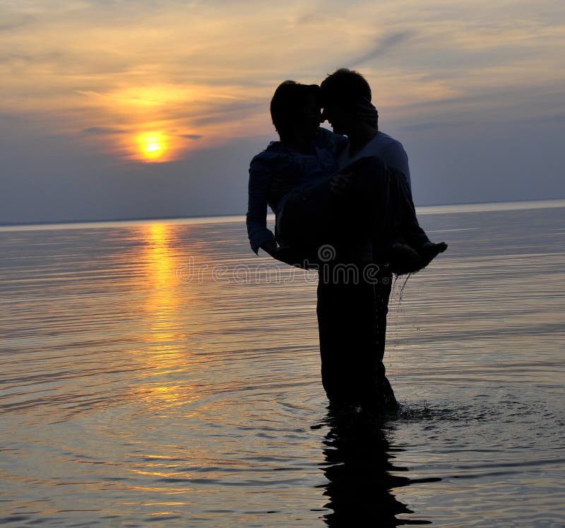 Sunset kiss stock photo. Image of romance, water, abstract - 1288234