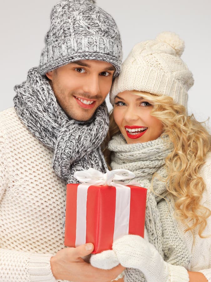 Romantic Couple in a Sweaters with Gift Box Stock Image - Image of ...