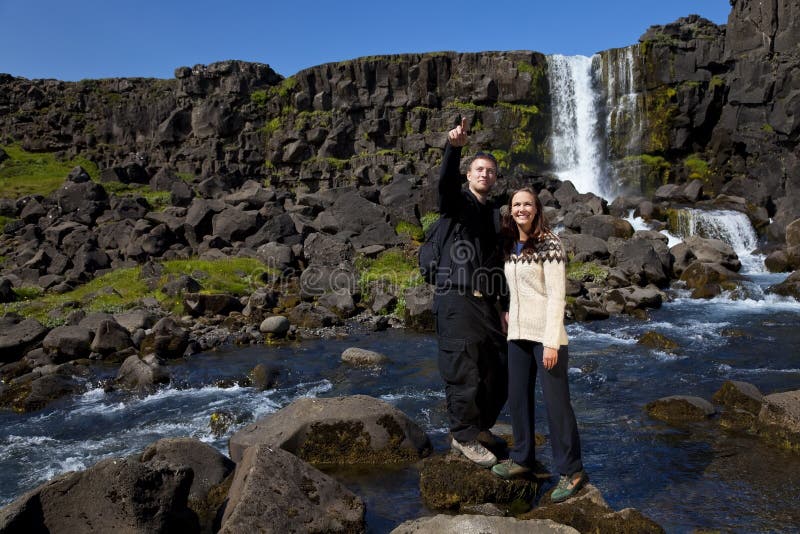Romantic Couple by a Waterfall Stock Photo - Image of scandinavian ...
