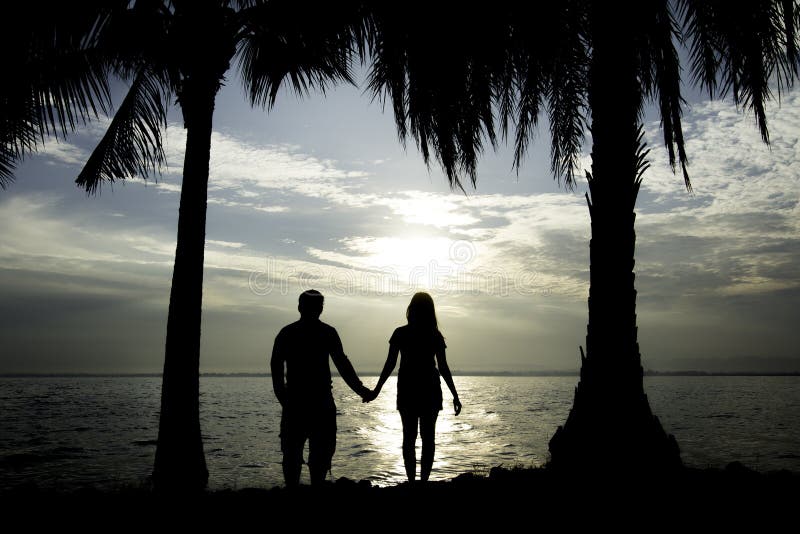 Romantic Couples, Young Handshake at Sunrise or Sunset Stock Image ...