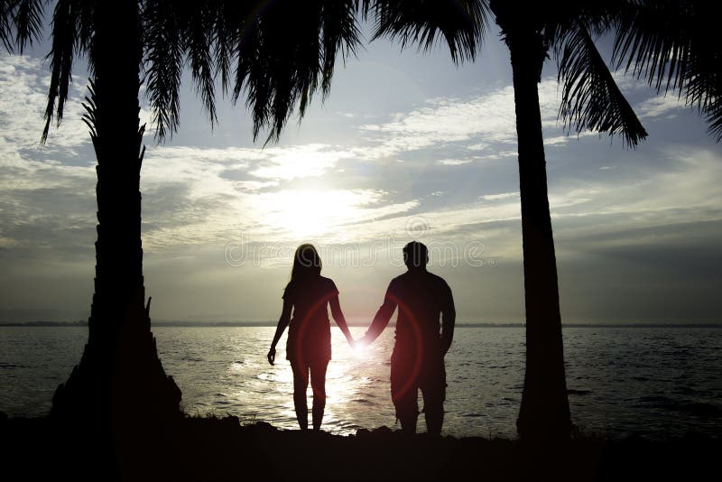 Romantic Couples, Young Handshake at Sunrise or Sunset Stock Photo ...