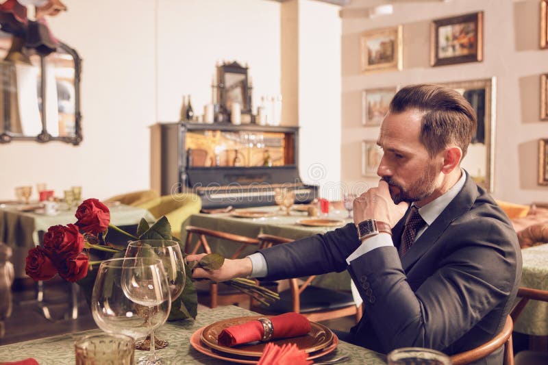 A Man is Waiting in a Restaurant Stock Image - Image of alcohol, girl ...