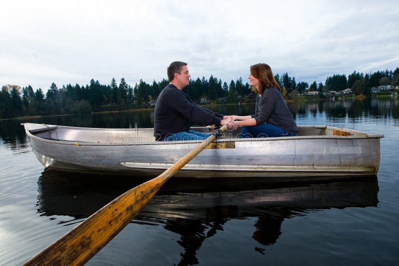 Romantic date on a rowboat stock image. Image of boat - 22226607