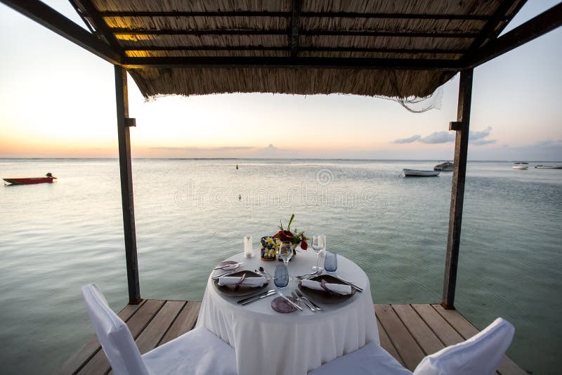 Romantic Dinner Setting on the Beach at Sunset. Stock Image - Image of ...