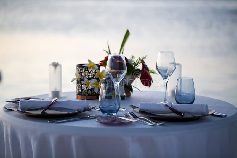 Romantic Dinner Setting on the Beach at Sunset. Stock Image - Image of ...