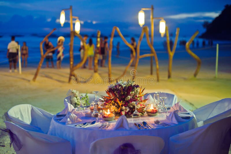 Romantic Dinner Setting on the Beach at Sunset Stock Photo - Image of ...