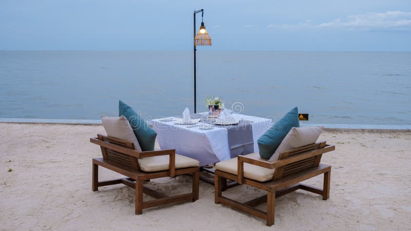 Romantic Dinner Table by the Ocean Stock Photo - Image of wedding ...