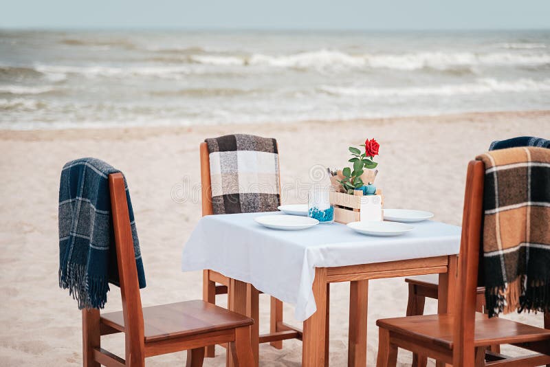 Romantic Dinner Table on Sea Shore. Preparing for Dinner in Restaurant ...