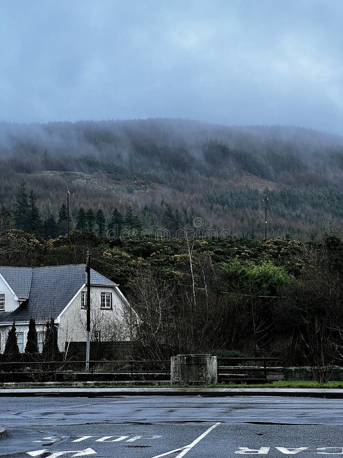 Fog cloudy hill stock image. Image of dramatic, house - 259202935