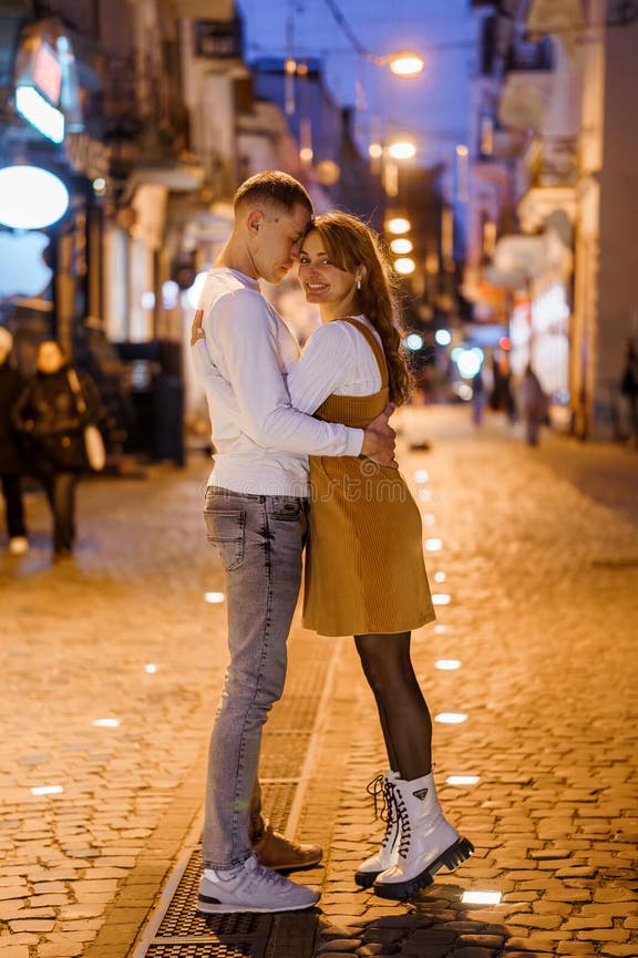 Romantic Evening Stroll in a Charming Cobblestone Street Stock Image ...