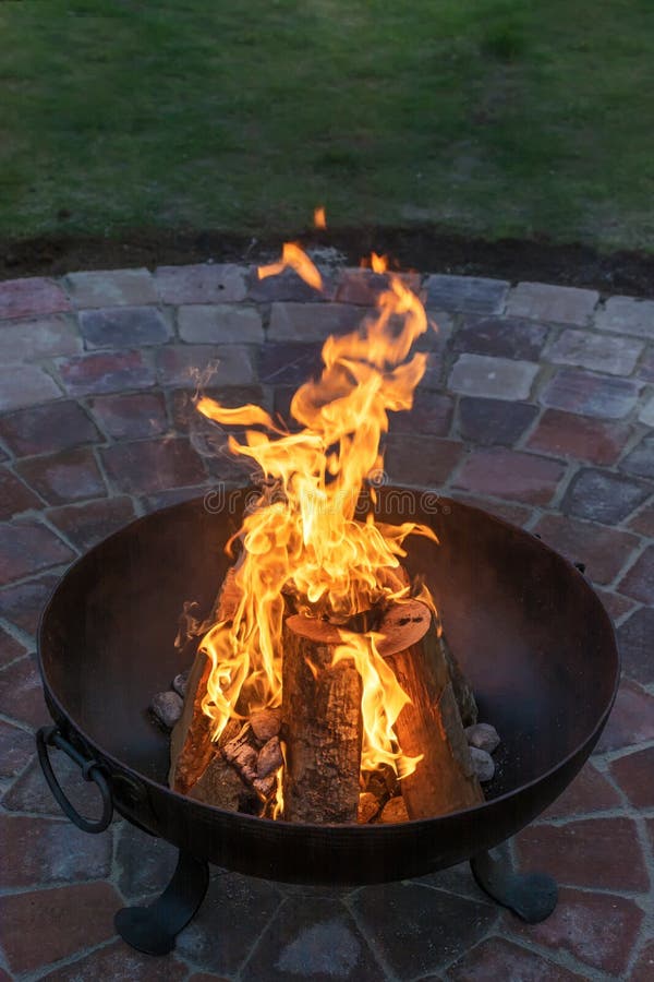 Romantic Fire in a Fire Bowl in Your Own Garden Stock Image - Image of ...