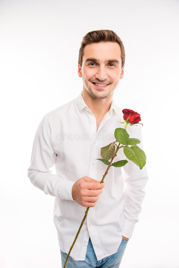 Romantic Handsome Man Gives a Red Rose Stock Image - Image of confident ...