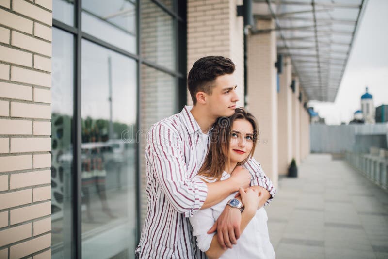Romantic Happy Couple Relax And Have Fun At Balcony In Their New Home