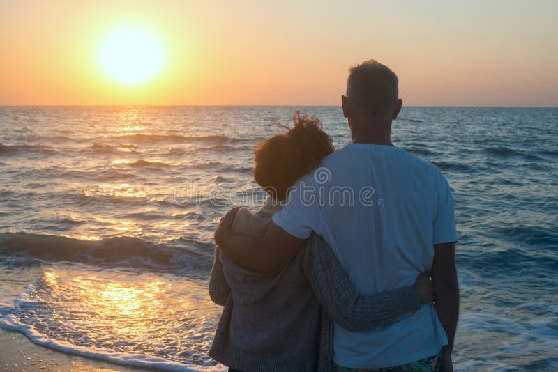Romantic Hugging Couple Enjoy the Sunset on the Beach Stock Image ...