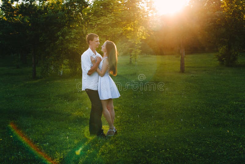Romantic Look of a Loving Couple Hugging Stock Photo - Image of moment ...