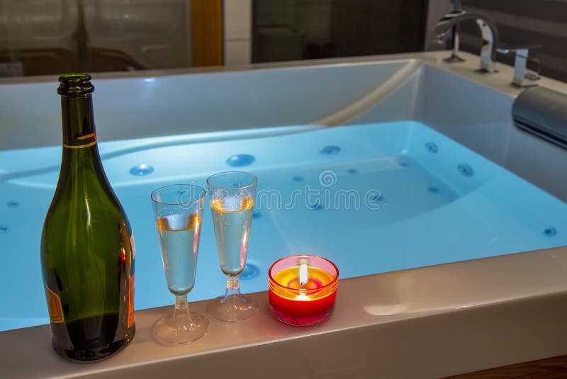 Romantic night in bath tub stock photo. Image of candle - 216026704