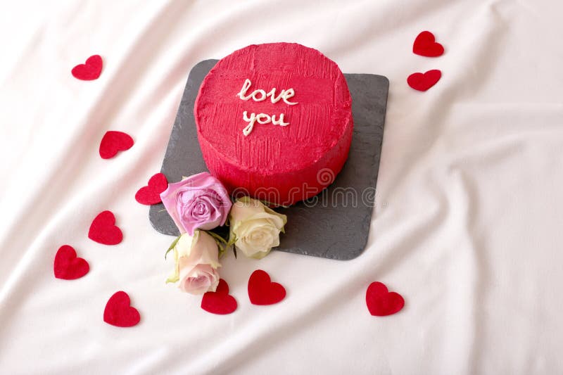 Romantic Red Cake with Love Message Surrounded by Roses and Hearts on ...