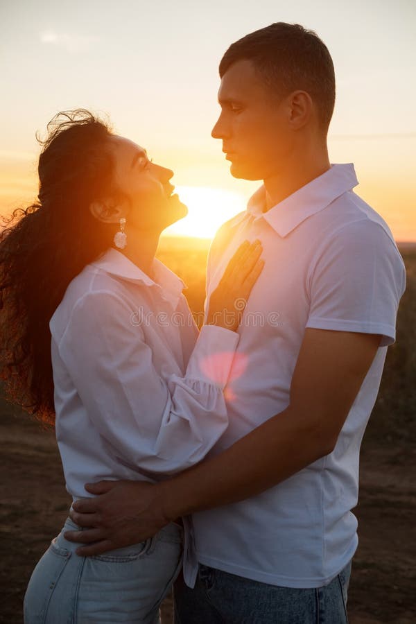 Romantic Relationship between Lovely Man and Woman at Sunset Stock ...