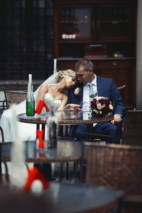 Romantic Relaxed Newlywed Couple Sitting at Restaurant Table Stock ...