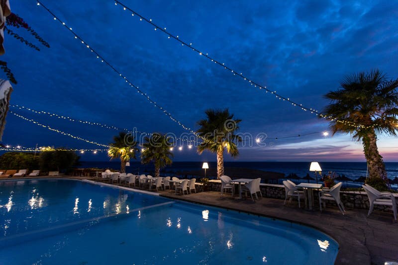 Romantic Restaurant by the Pool at Night Stock Image - Image of evening ...