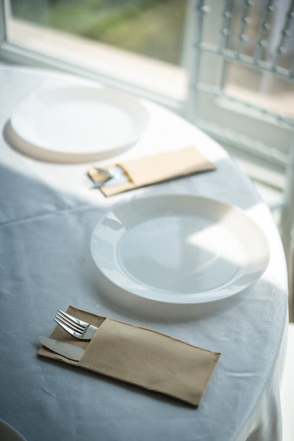 Restaurant Table Setting with White Plate and Cutlery Stock Image ...