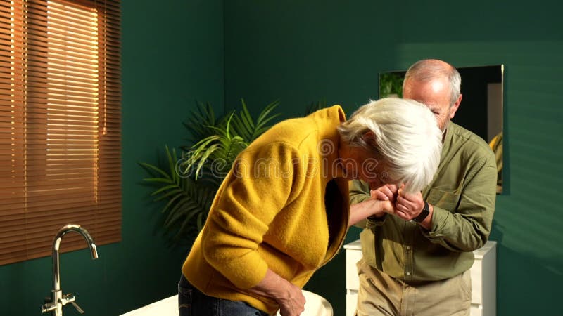 Romantic Senior Couple Talking and Caressing on the Bathroom Stock ...
