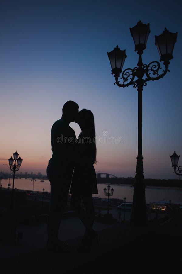 Romantic Silhouettes of a Couple in Love Stock Photo - Image of evening ...