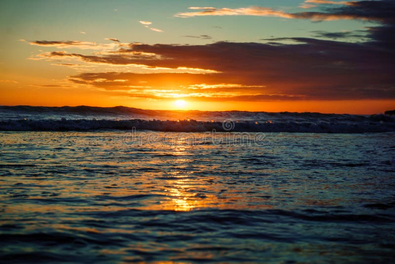 Romantic Sunset on an Empty Beach Stock Photo - Image of catolic ...