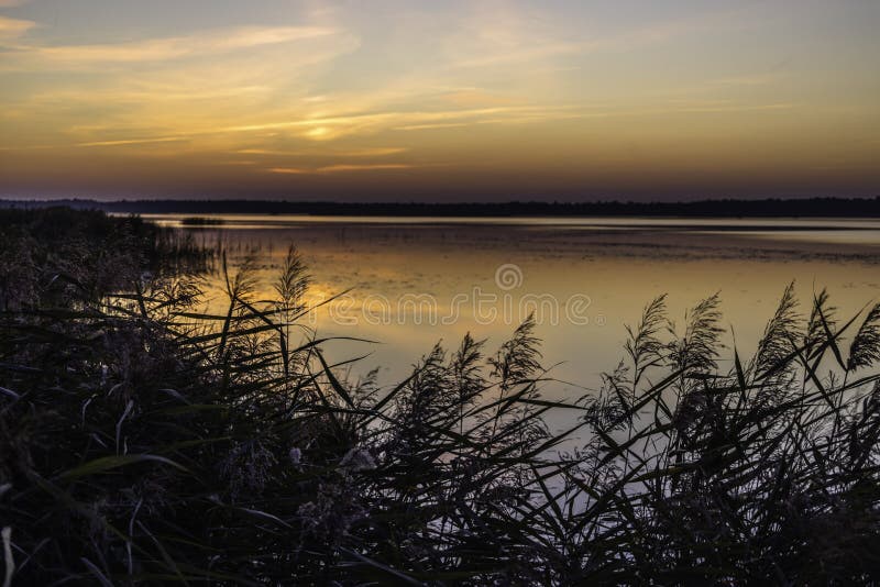 Romantic Sunset Glowing Twilight Over the Lake Stock Image - Image of ...