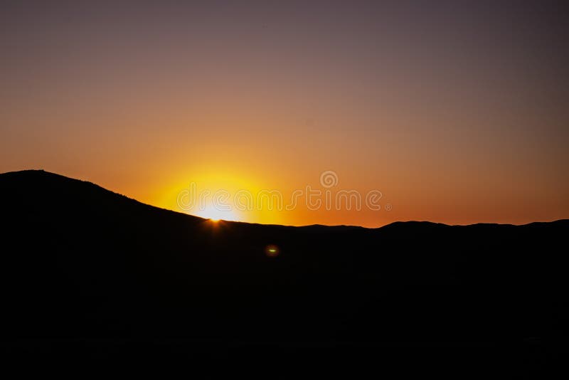 Romantic Sunset in Small Mountains when the Sun Went Behind the Hills ...