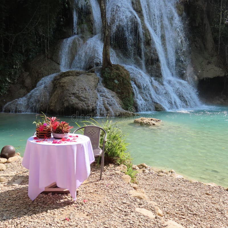 Romantic Table by the Waterfall in Nature Stock Image - Image of palm ...