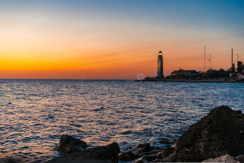 Romantic View of Lighthouse from the Cliff at Sunset Stock Image ...