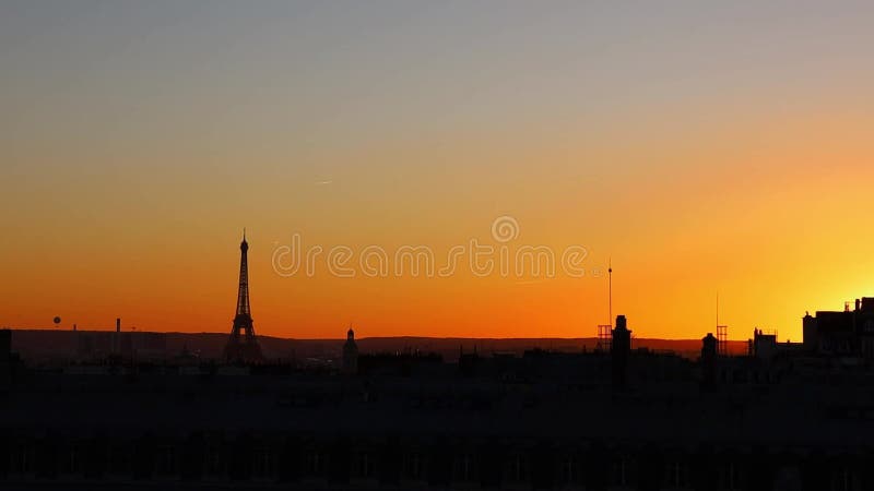 Romantic View of Rooftops and Eiffel Tower with the Sunset Sky in Paris ...