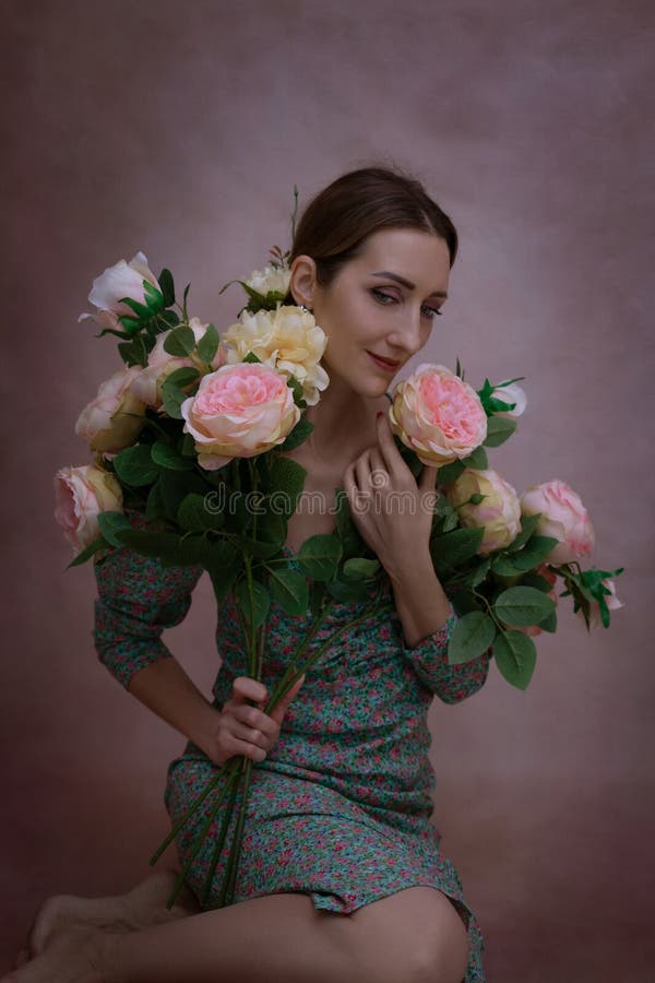 Romantic Woman in Hat with Bouquet of Flowers.Art Processing Stock ...