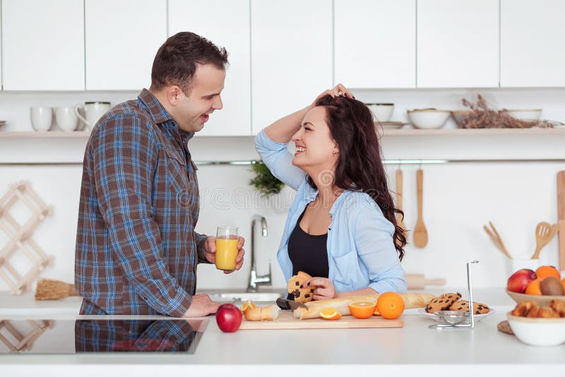 Romantic Young Couple Having Breakfast in the Kitchen Stock Image ...