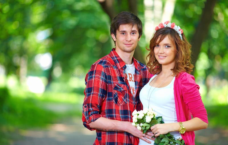 Romantic Young Couple in Spring Park Stock Photo - Image of portrait ...