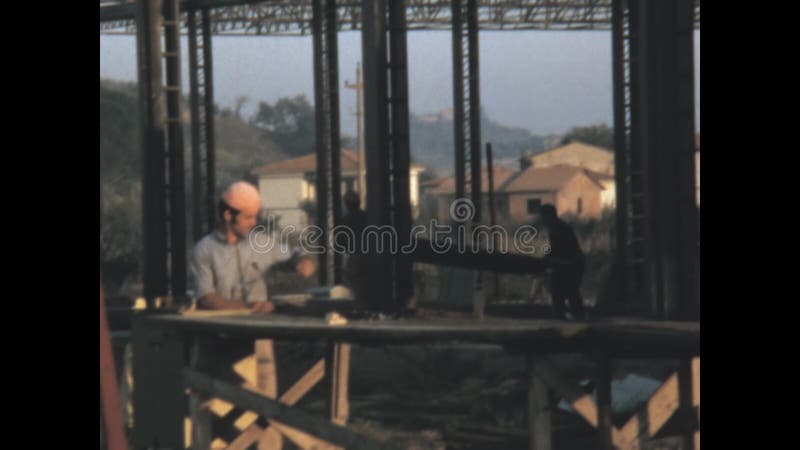 Italy 1971, Professional Workers in Construction Site Working Scene in ...