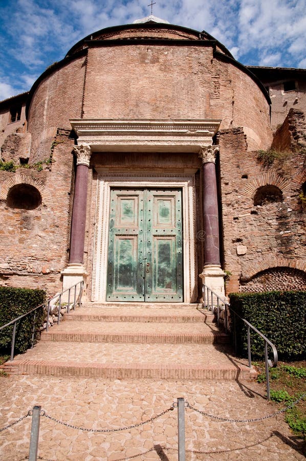 Temple of Romulo in the Roman Forum. Old Green Door with Purple Columns ...