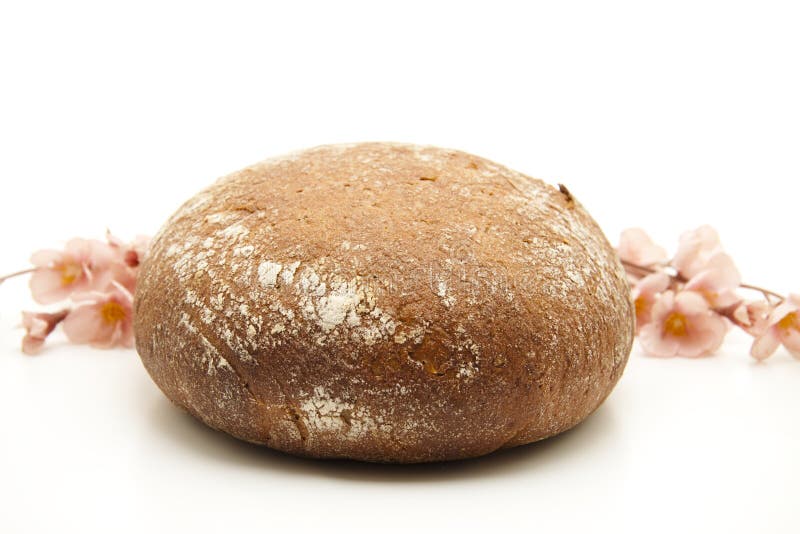 Rond brood met bloem stock foto. Image of ronde, vrijgesteld - 17211196